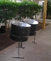 The Mid-Range Pans Section of a Steelband (Steel Drum Band)